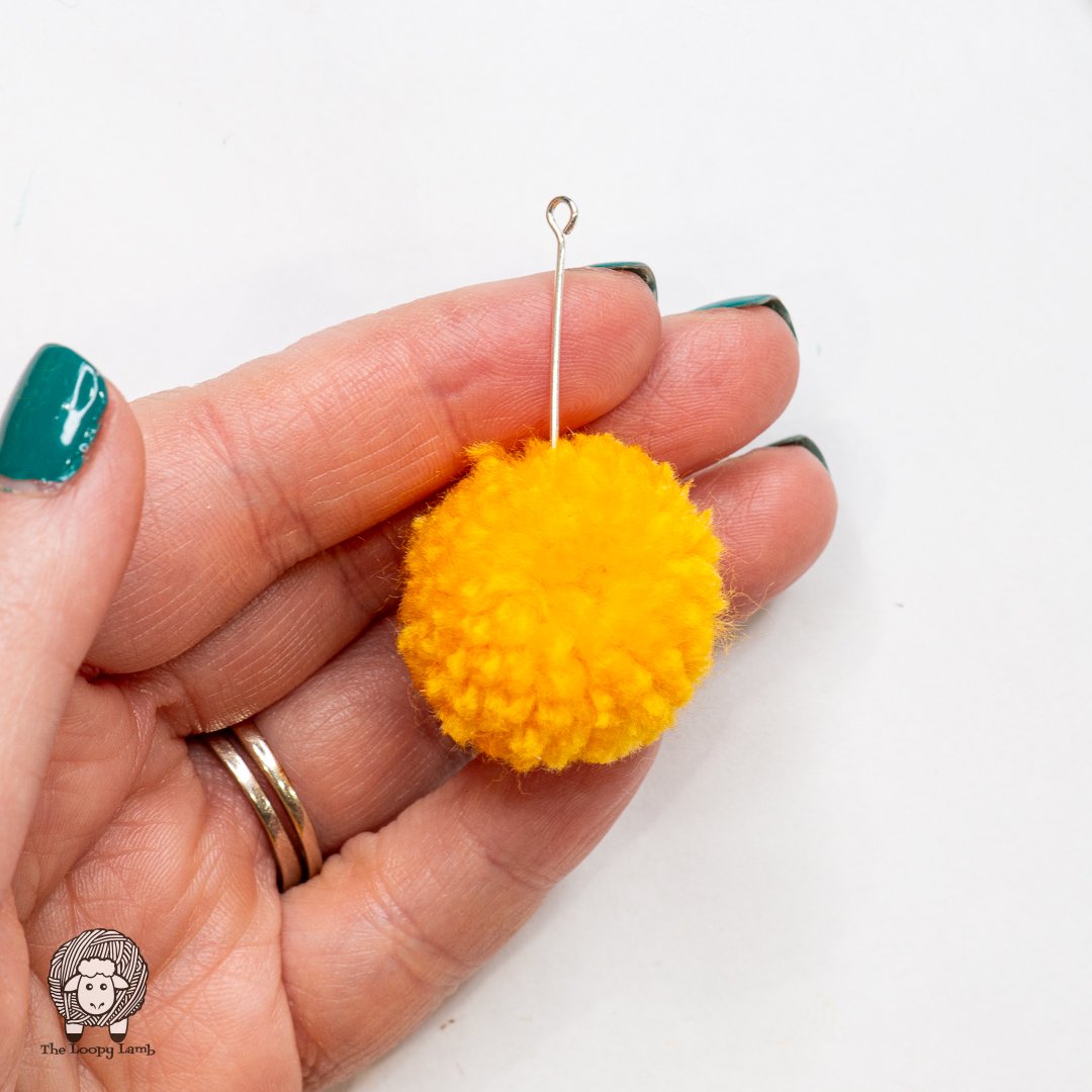 How to Make DIY Pom Pom Earrings With Scrap Yarn Tutorial